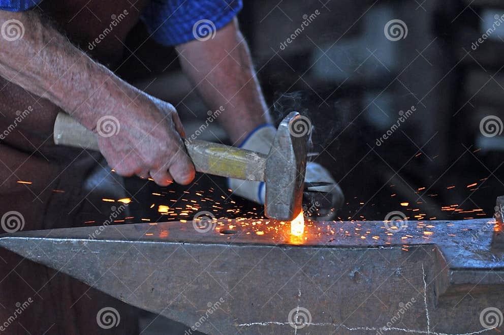 Hammer and anvil stock photo. Image of action, heat, crafts - 30984700
