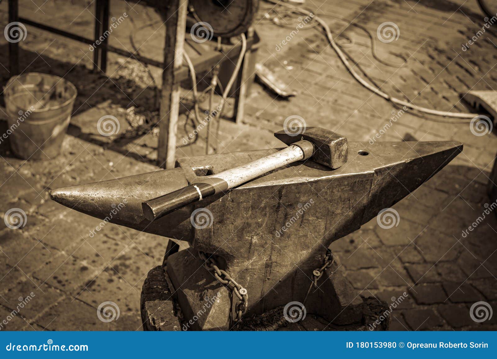 A hammer on the anvil stock photo. Image of closeup - 180153980