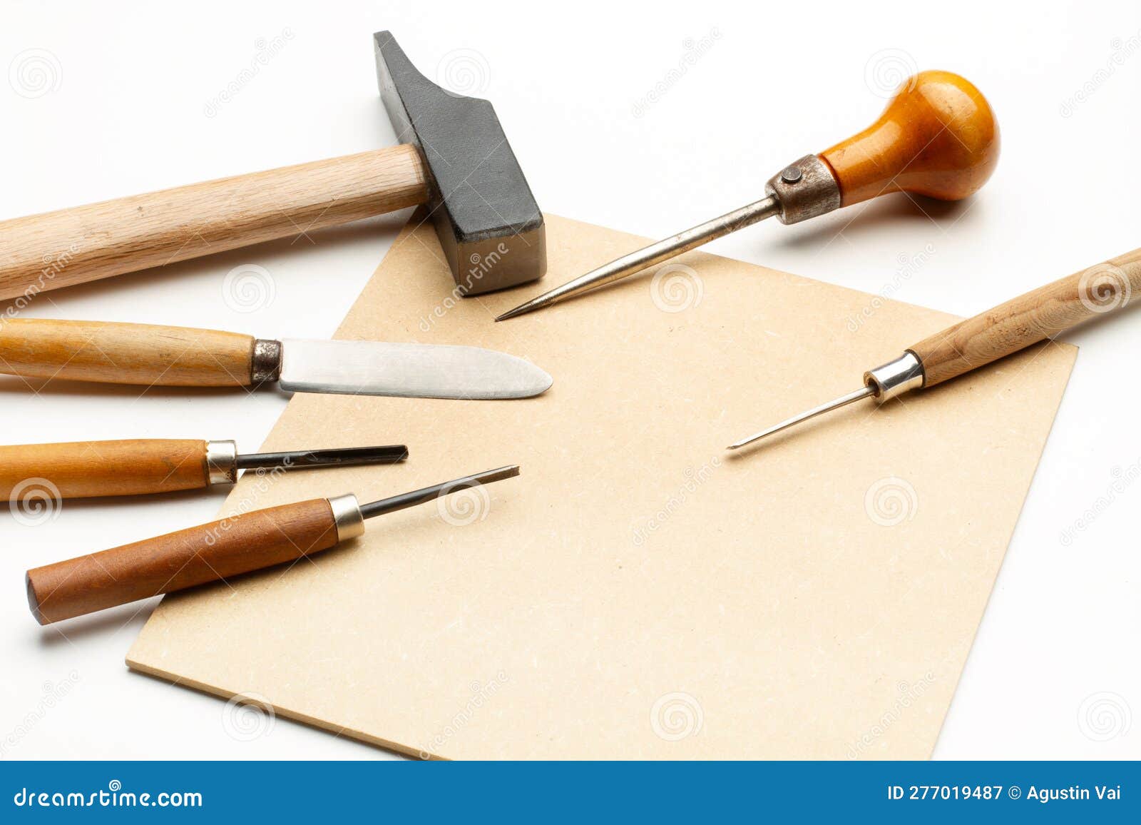 Hammer, Awl and Gouges with Wooden Handles on a Pieces of Wood and on a ...