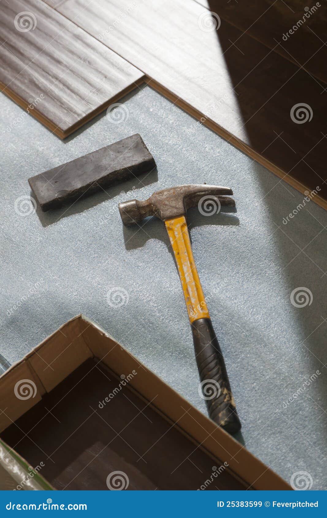 Hammer and Block with New Laminate Flooring Stock Image - Image of ...