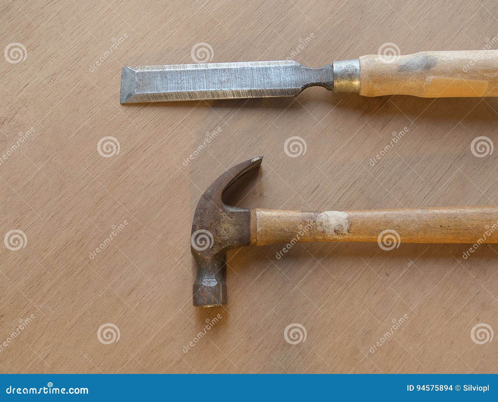 Hammer and Chisel on Wooden Table Background Stock Photo - Image of ...