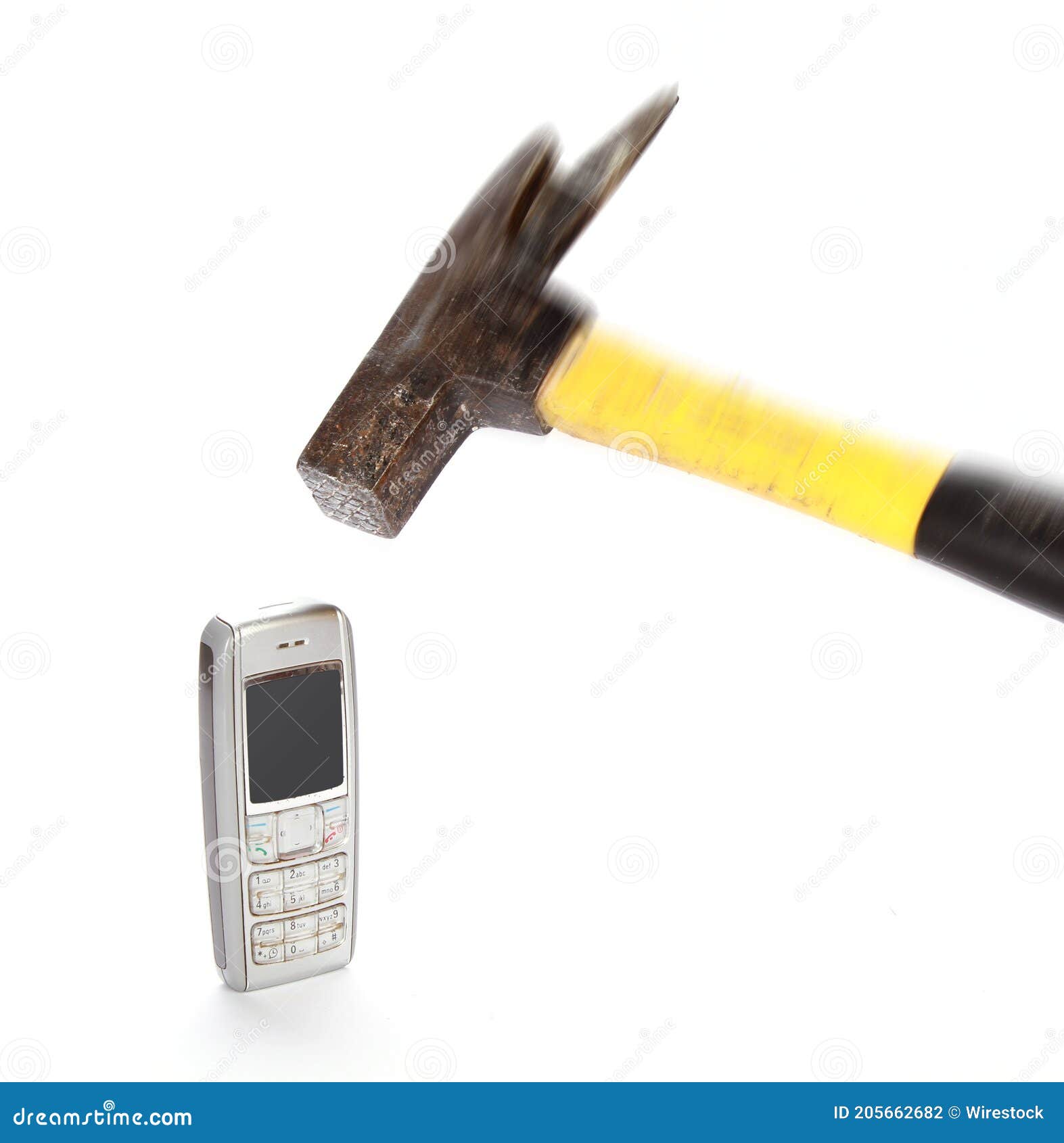 Hammer Crashing an Old Cell Phone on a White Background Stock Photo ...
