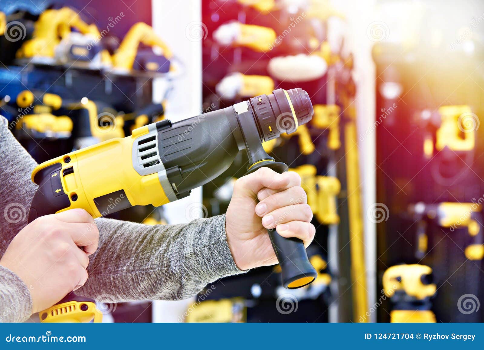 Hammer Drill in Hands at Shop Stock Photo - Image of electrical, hobby ...