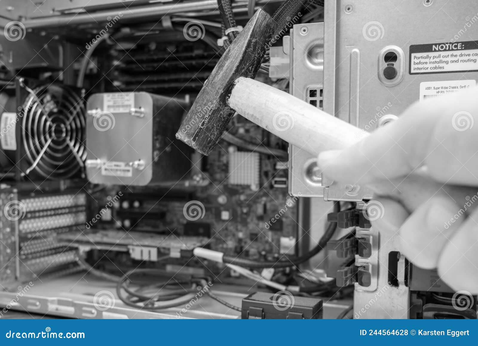 Hammer is Held in Front of an Unscrewed PC Stock Photo - Image of ...