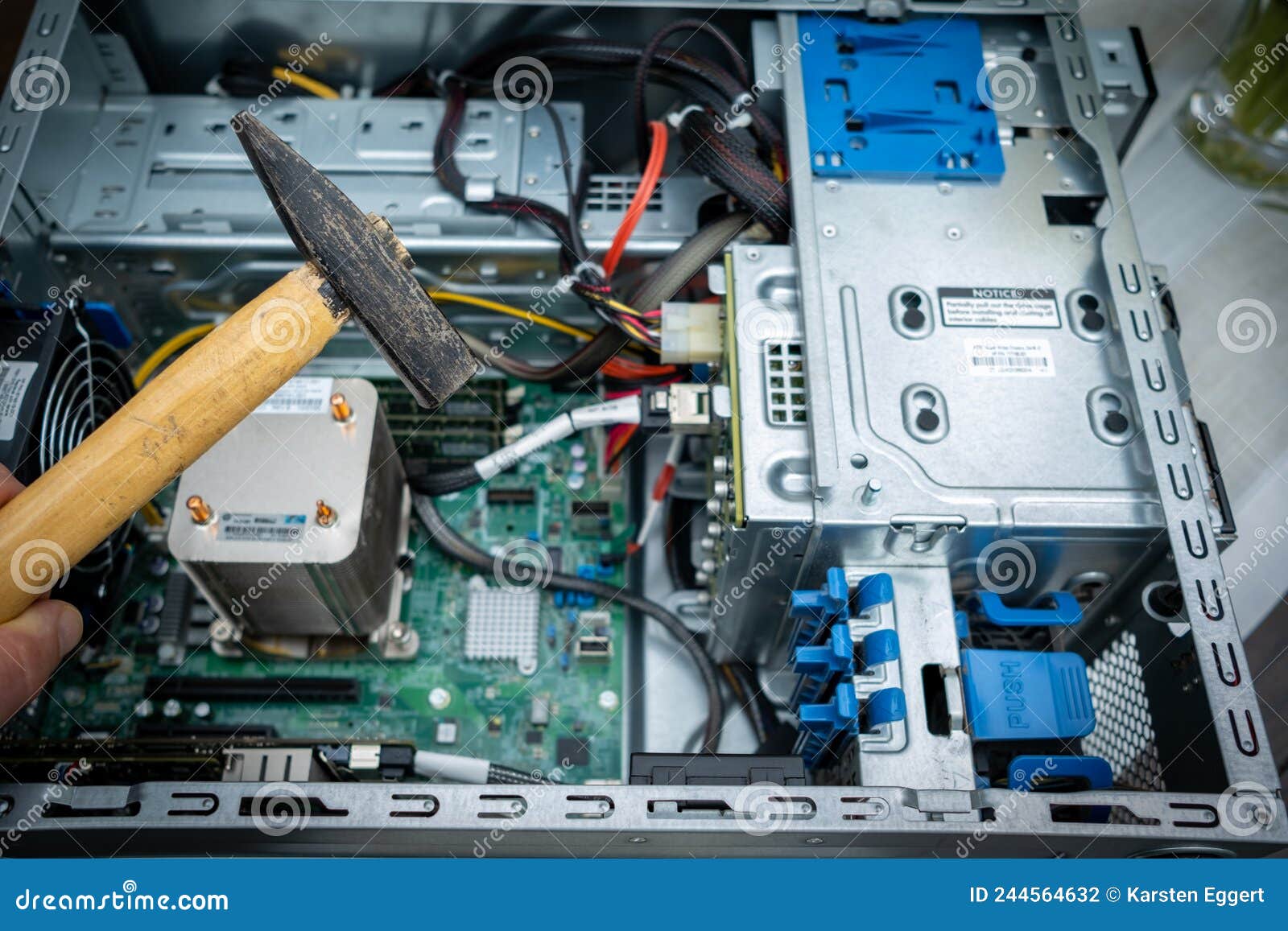Hammer is Held in Front of an Unscrewed PC Stock Photo - Image of ...