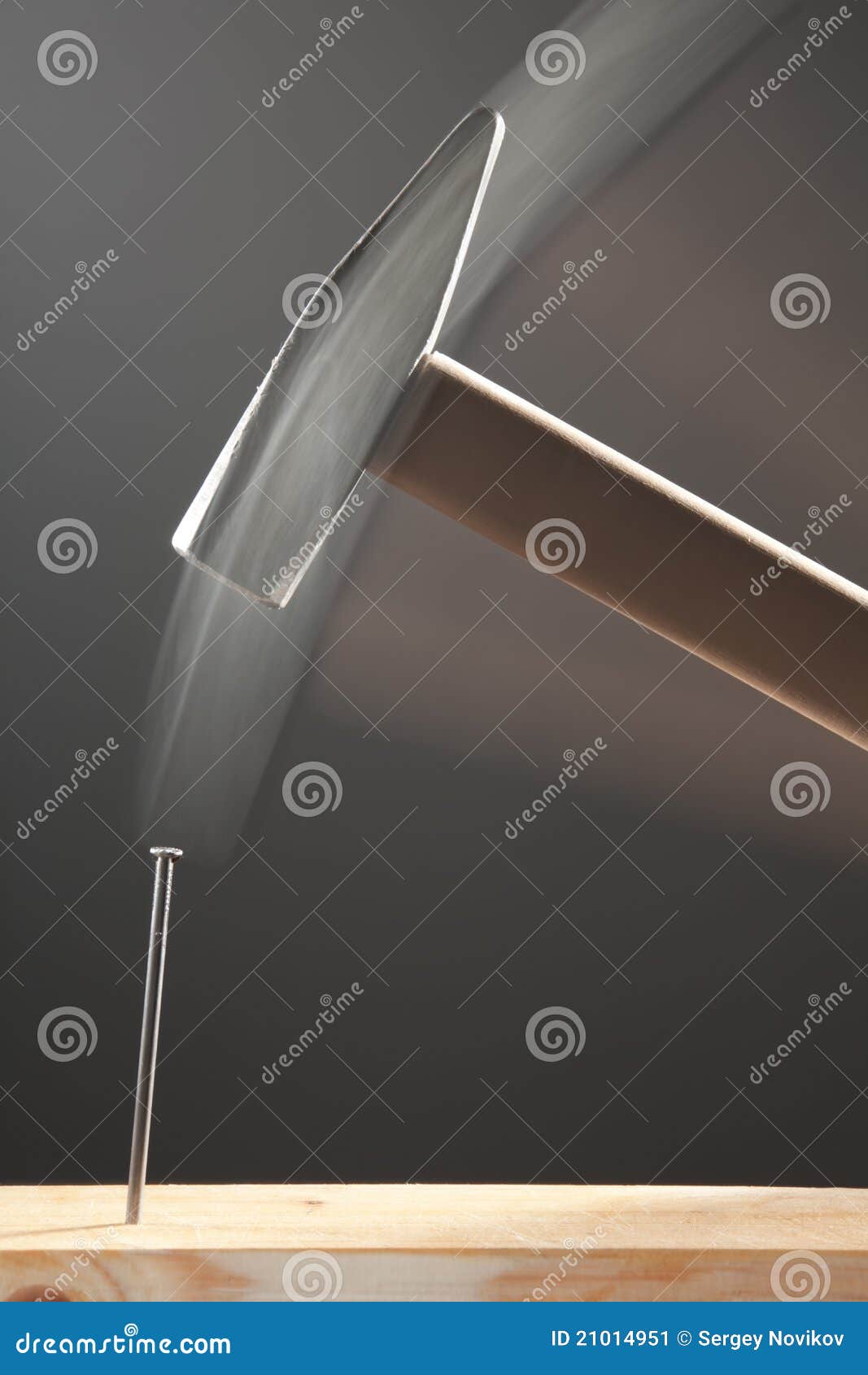 Hammer hitting the nail stock image. Image of detail - 21014951