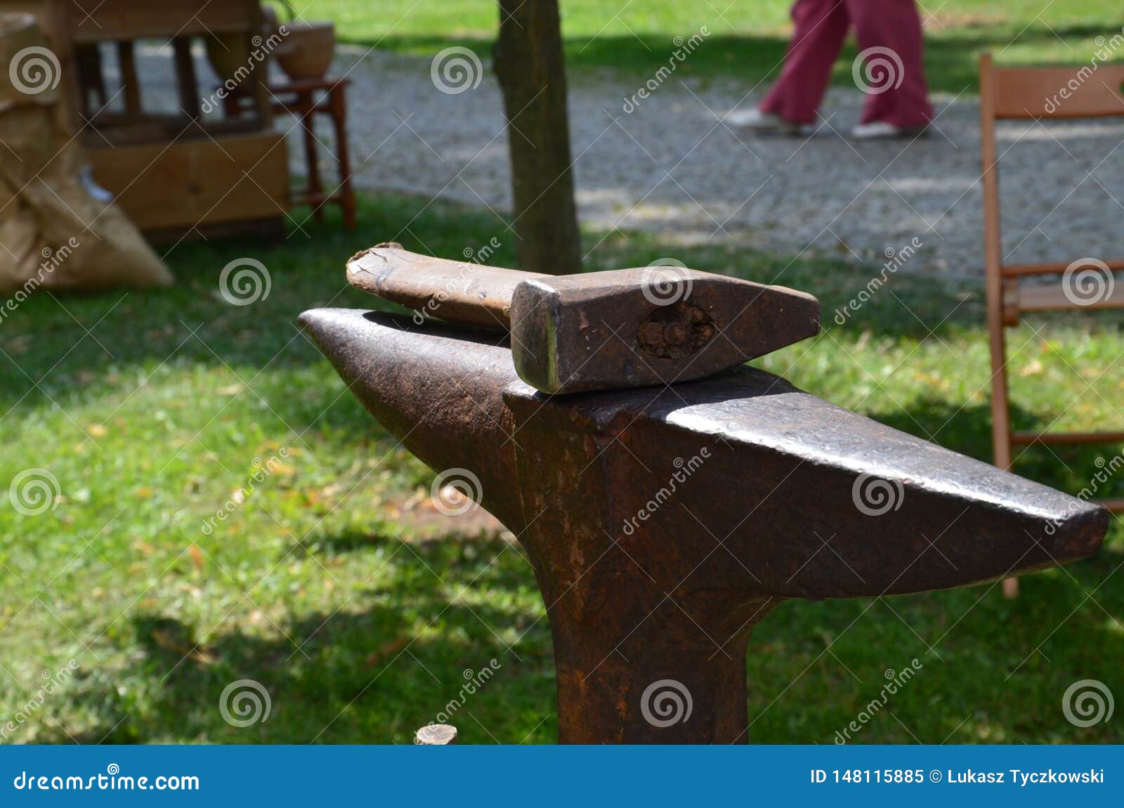 A Hammer Laying on an Anvil in the Park at Sunny Day Stock Image ...