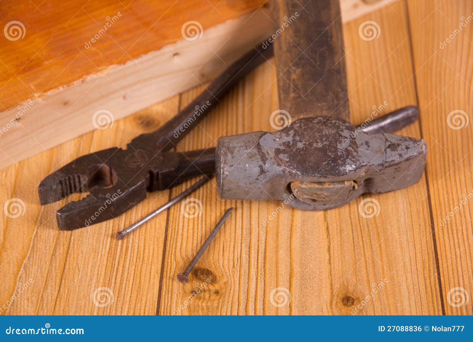 Hammer and pliers stock photo. Image of objects, board - 27088836