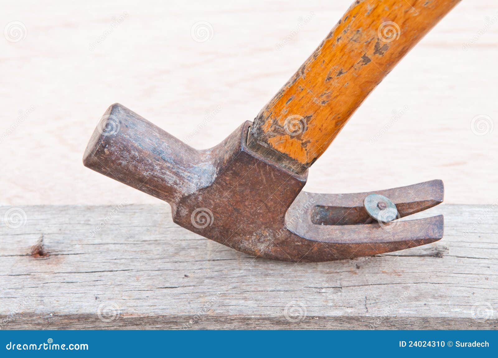 Hammer Pulling Out a Nail Out of a Piec Stock Photo - Image of nail ...