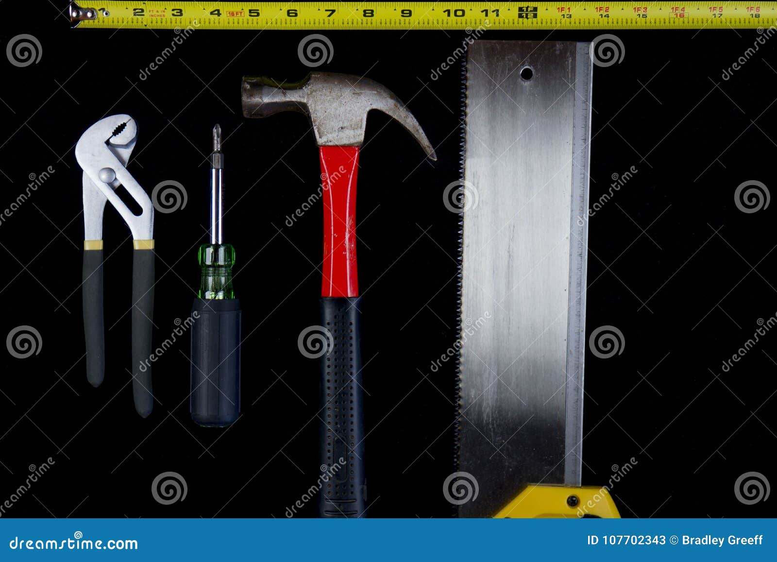 Hammer Screwdriver Measuring Tape Channel Locks and Saw Stock Image ...