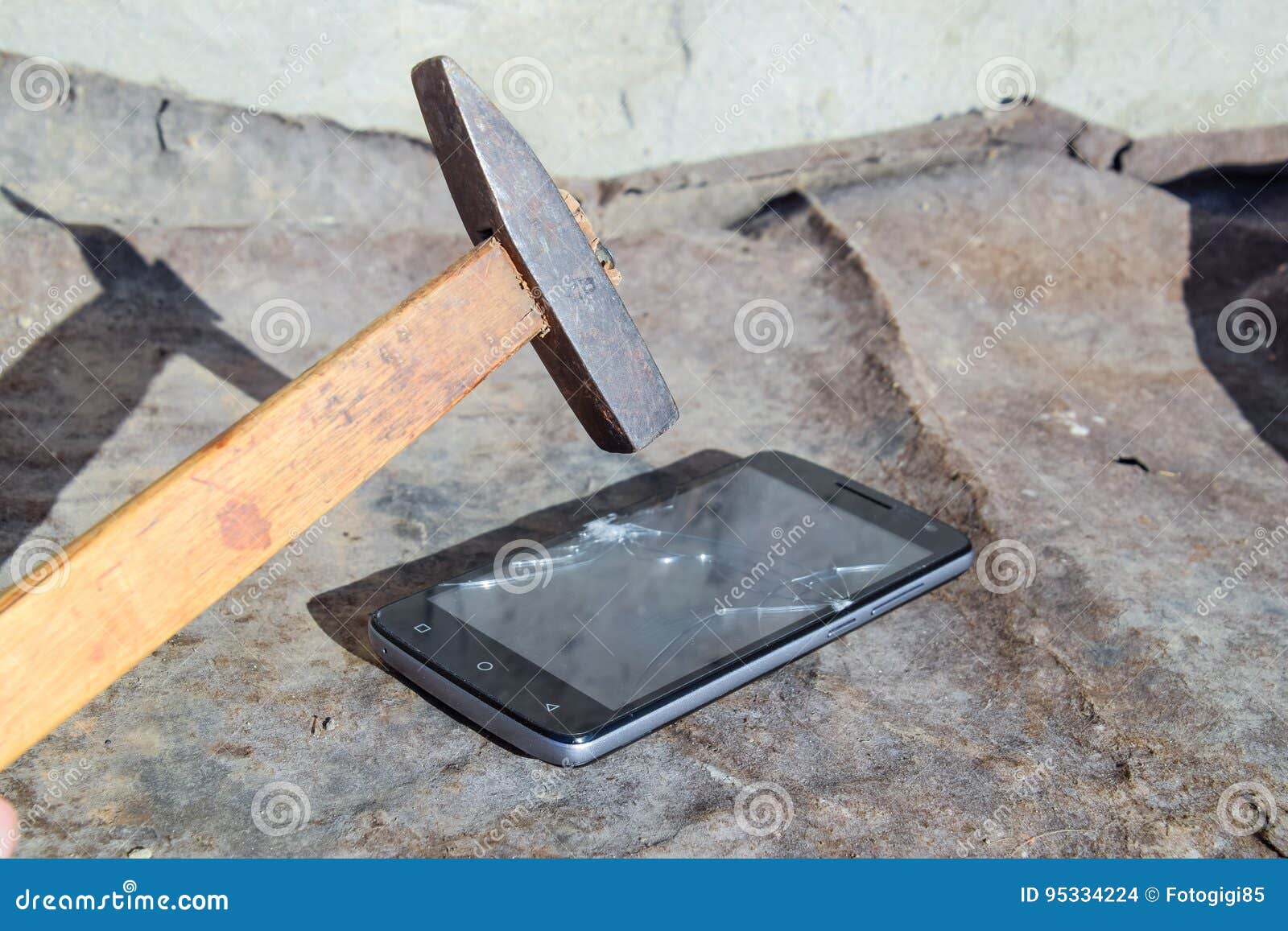 Hammer and Smartphone. the Screen of the Smartphone, a Broken Ha Stock ...