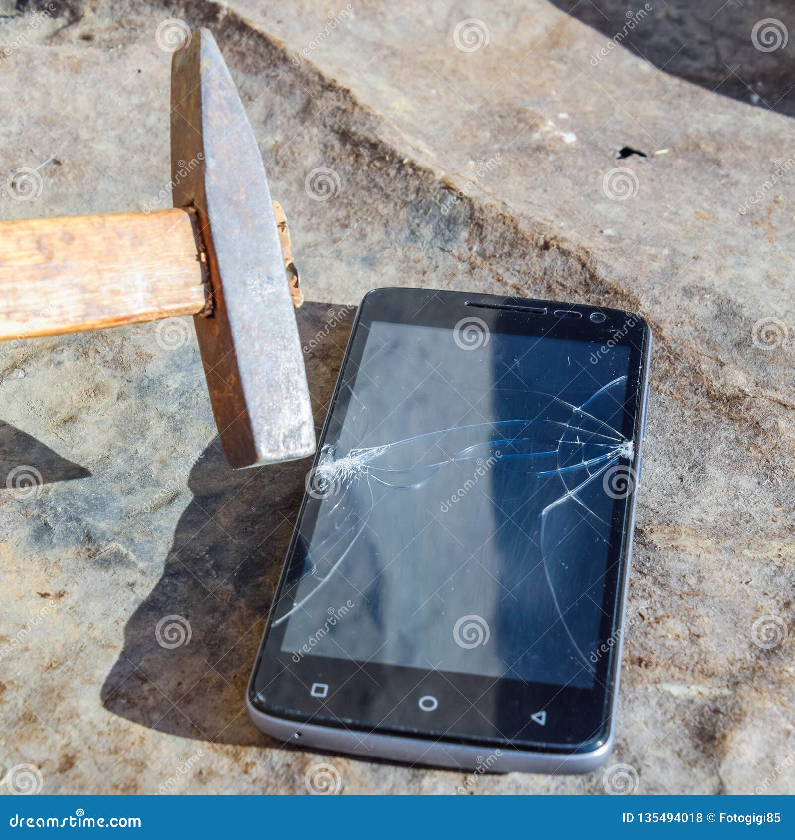Hammer and Smartphone. the Screen of the Smartphone, a Broken Ha Stock ...