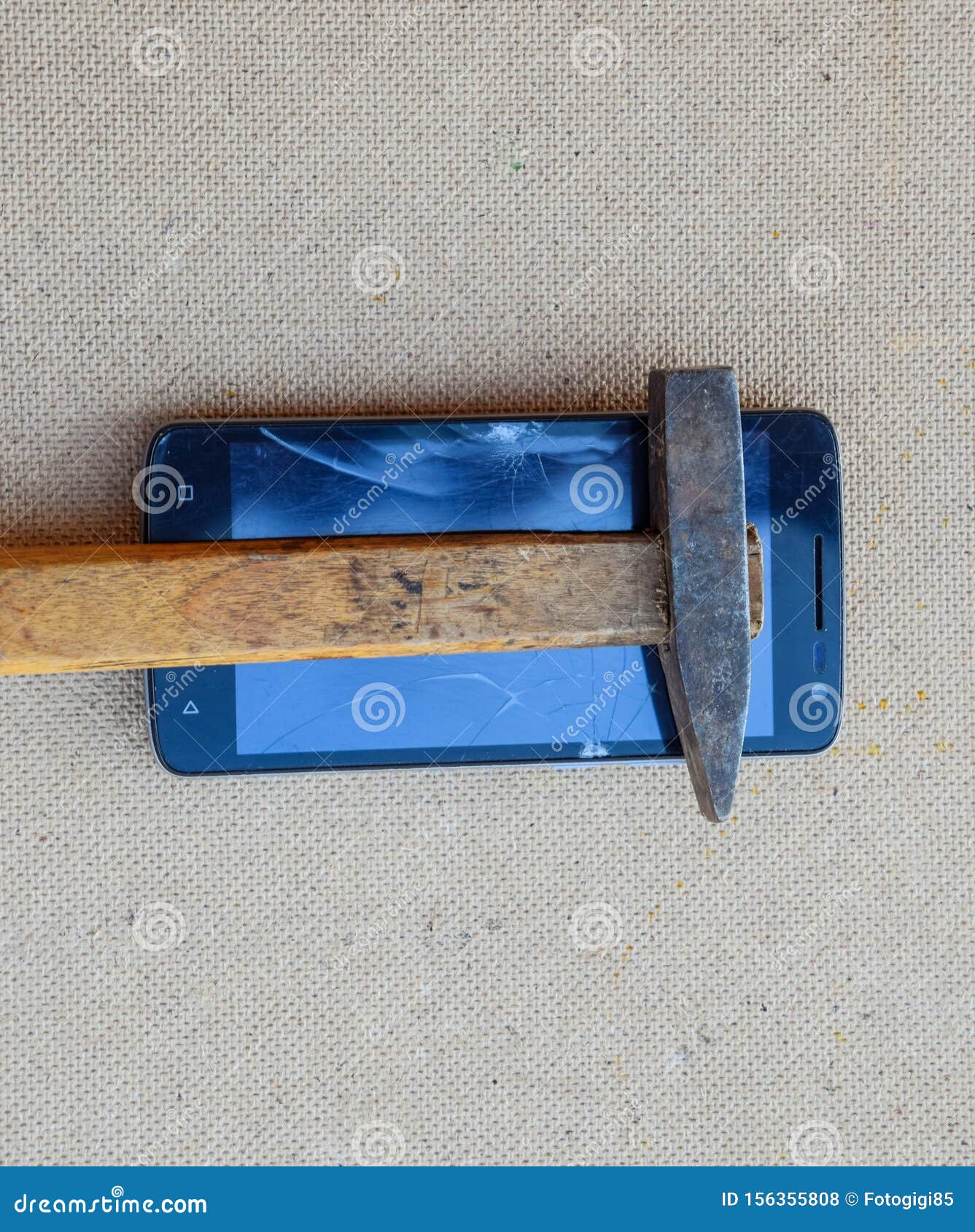 Hammer and Smartphone. the of the Smartphone, a Broken Ha Stock Photo ...