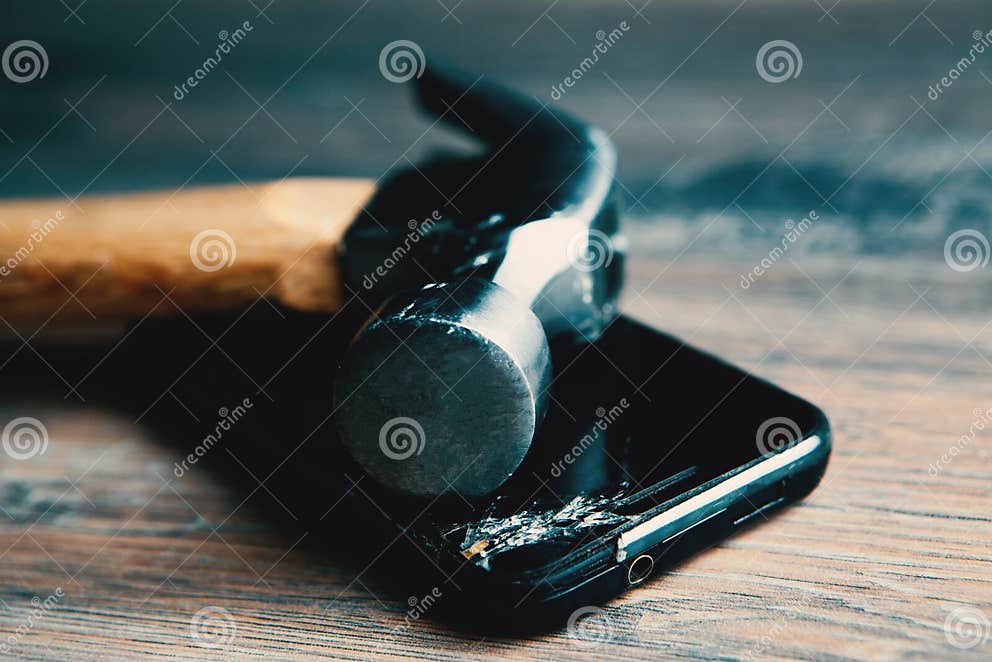 Hammer and Smashed Phone on the Table Stock Image - Image of wreck ...