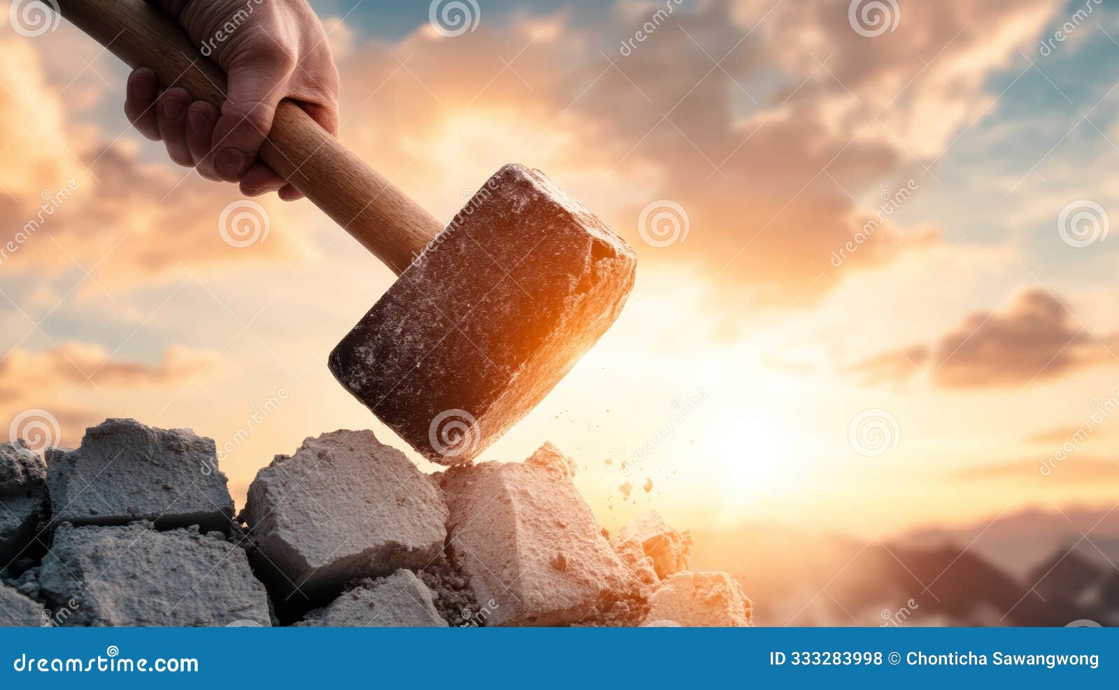 A Hammer Strikes a Stone in a Sunset Scene, Symbolizing Hard Work ...