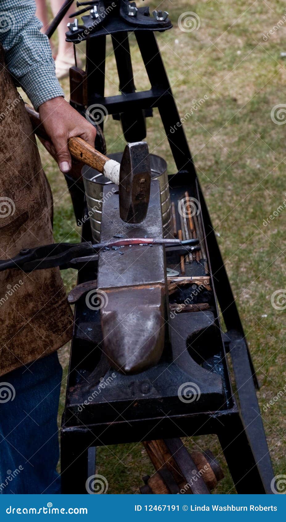 Hammering metal stock image. Image of blacksmith, profession - 12467191