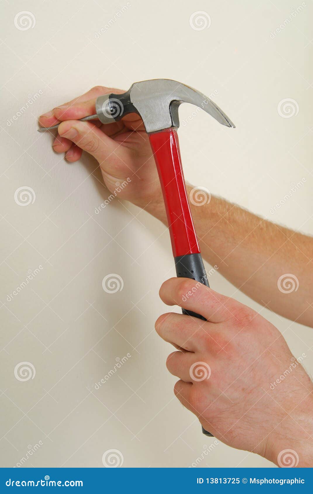 Hammering a nail stock image. Image of decorating, hands - 13813725