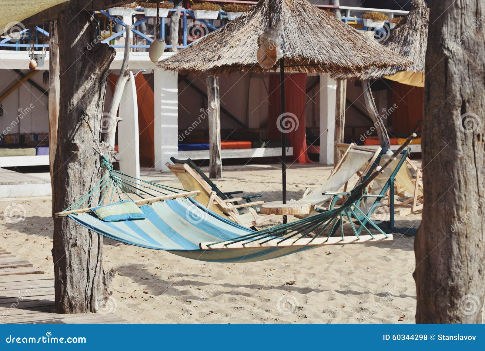 Hammock on the beach bar stock photo. Image of color - 60344298