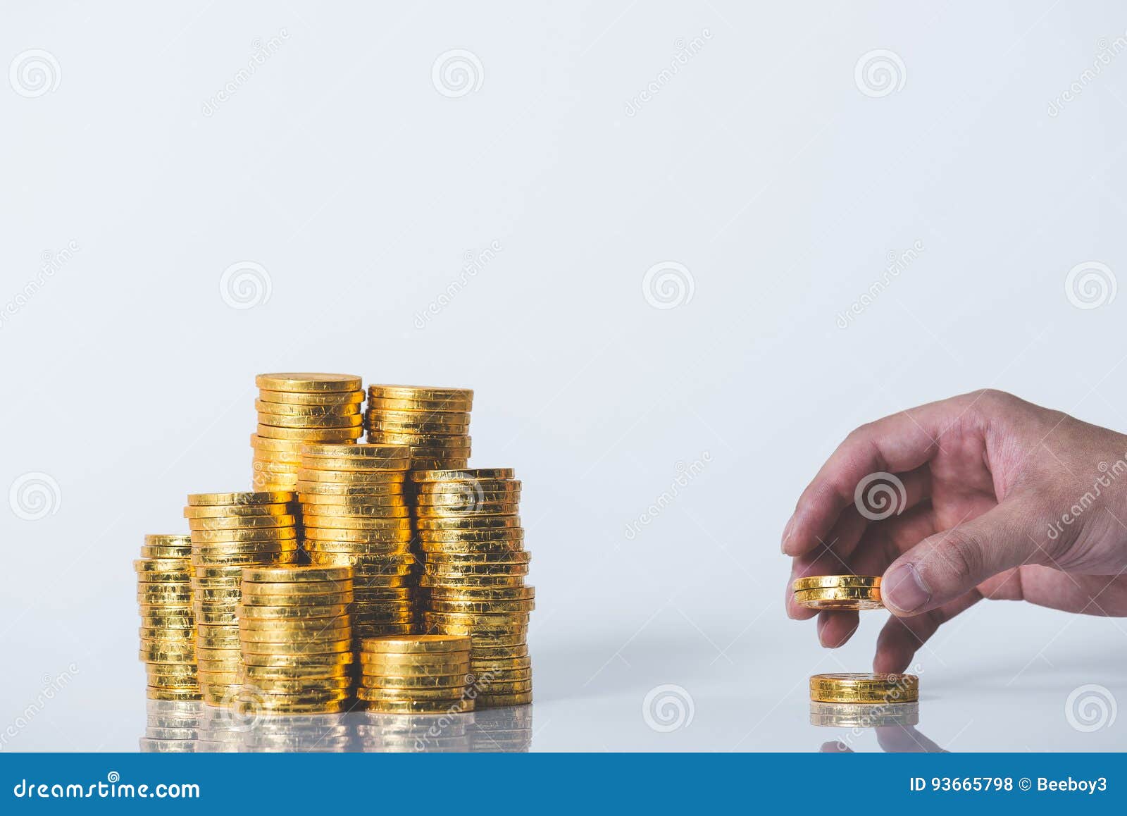Hand accumulating money stock photo. Image of business - 93665798