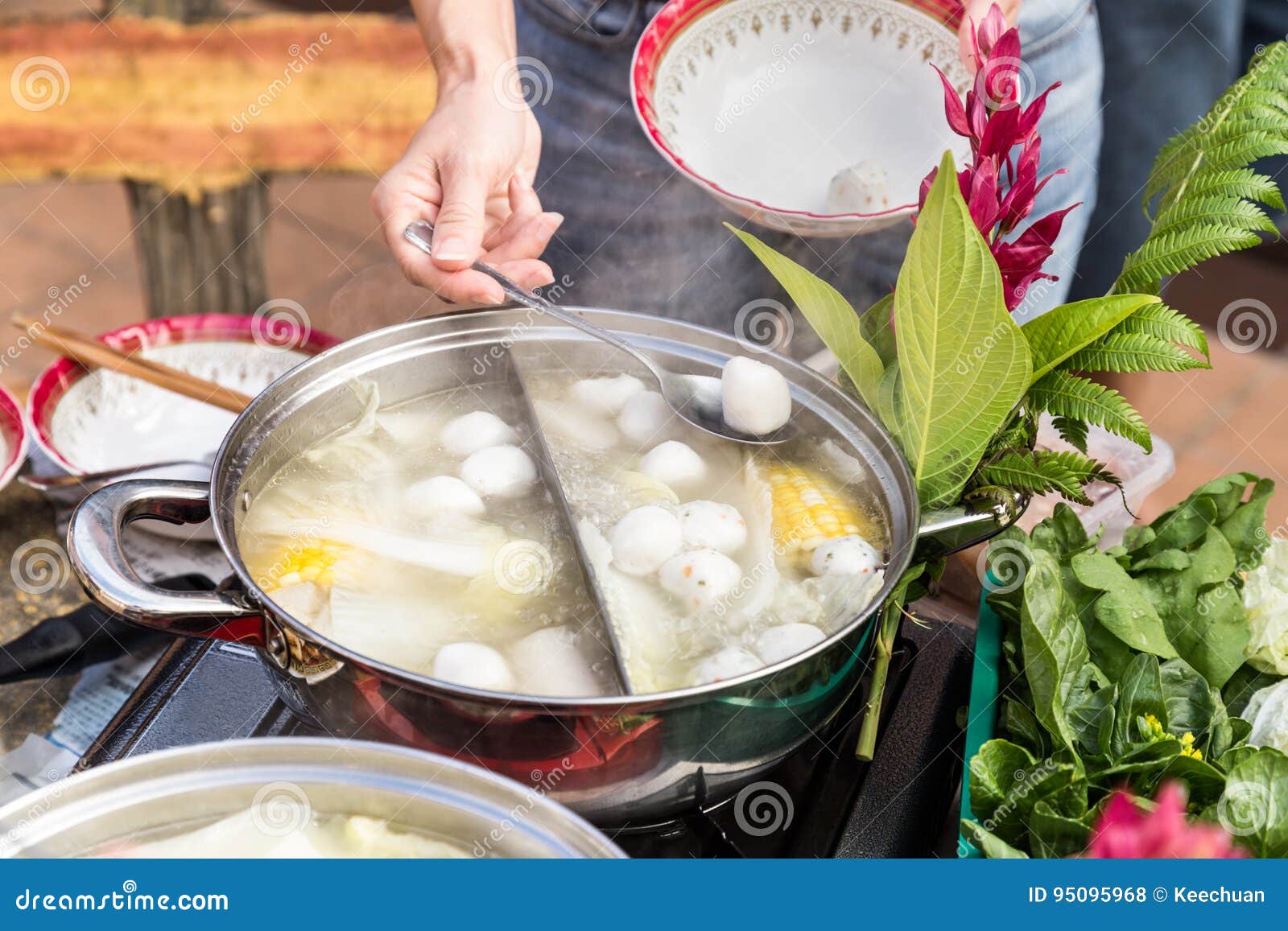 Hand Adding Ingredient into Asian Steamboat Pot Meal Stock Photo ...