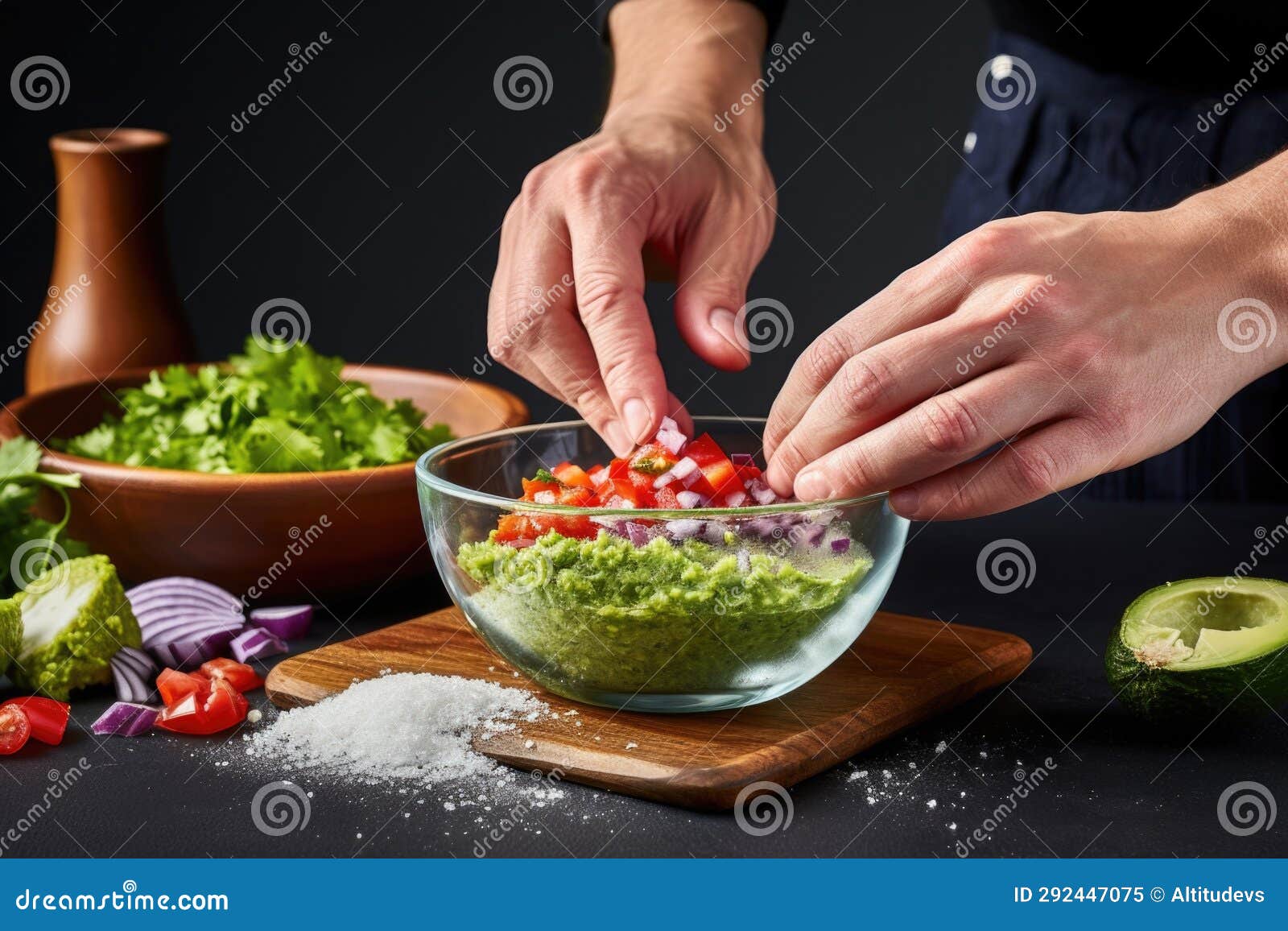 Hand Adding Salt To a Bowl of Fresh Guacamole Stock Illustration ...