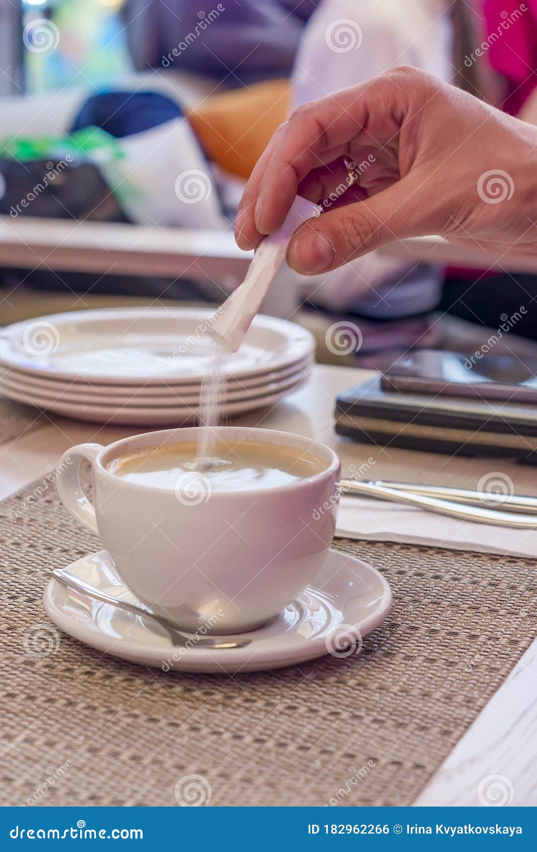 A Hand Adding Sugar To a Cup of Black Coffee Stock Photo - Image of ...