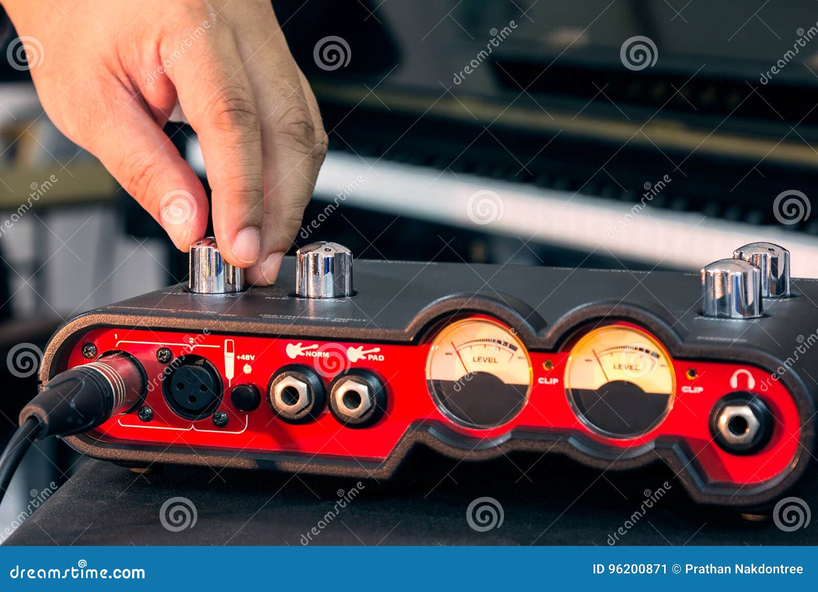 Hand Adjust Volume of the Audio Interface Stock Image - Image of ...