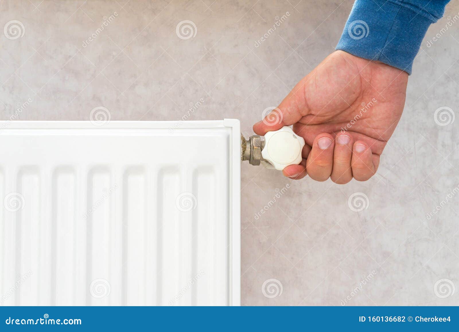 Hand Adjusting the Knob of Heating Radiator. Stock Photo - Image of ...