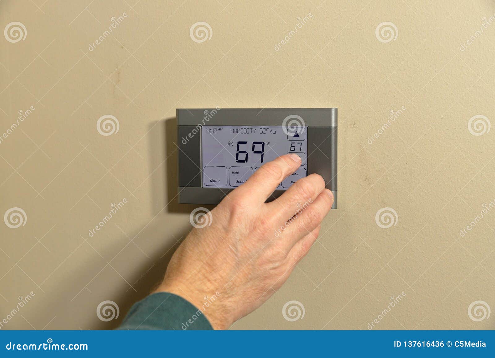 Hand Adjusting Temperature on Thermostat Stock Photo - Image of budget ...