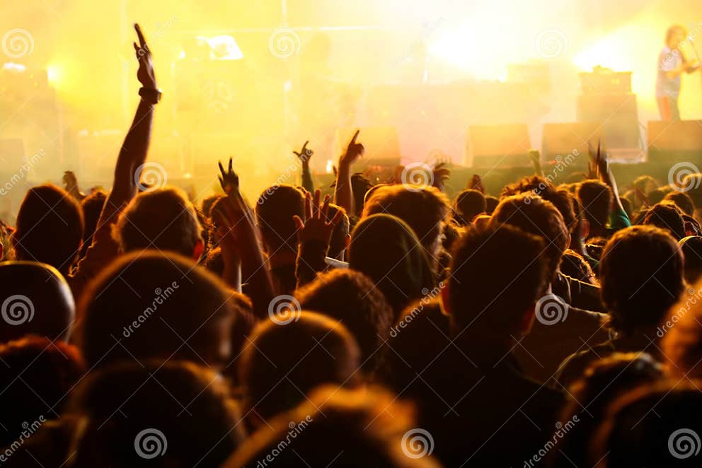 Hand in the Air in a Concert Stock Image - Image of spotlight, concert ...