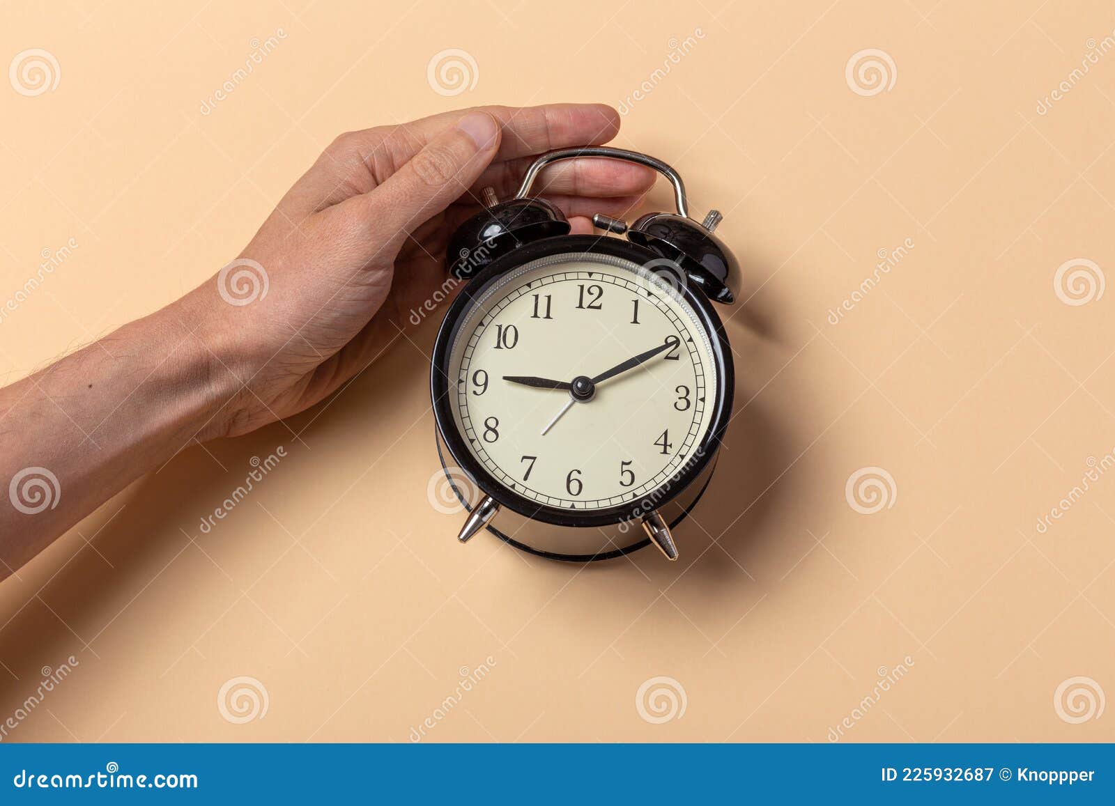 Hand with alarm clock stock image. Image of clock, alert - 225932687