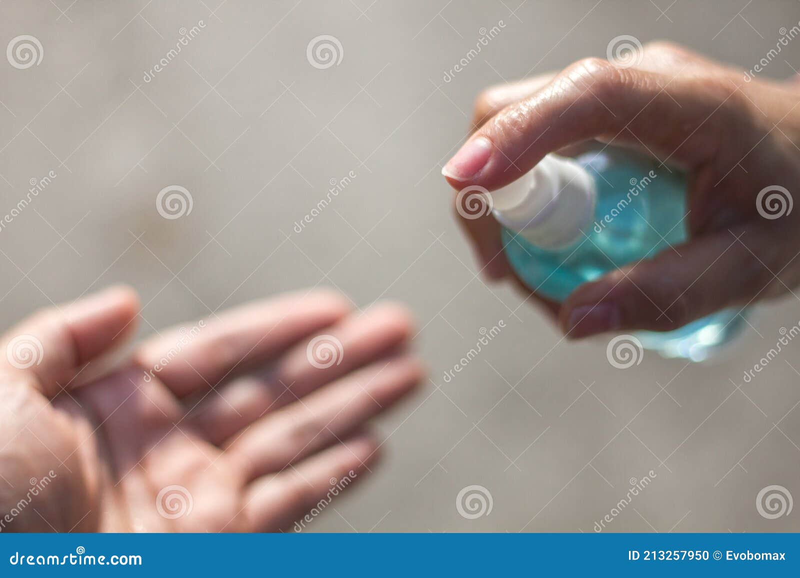 Hand with alcohol spray stock photo. Image of safeathome - 213257950