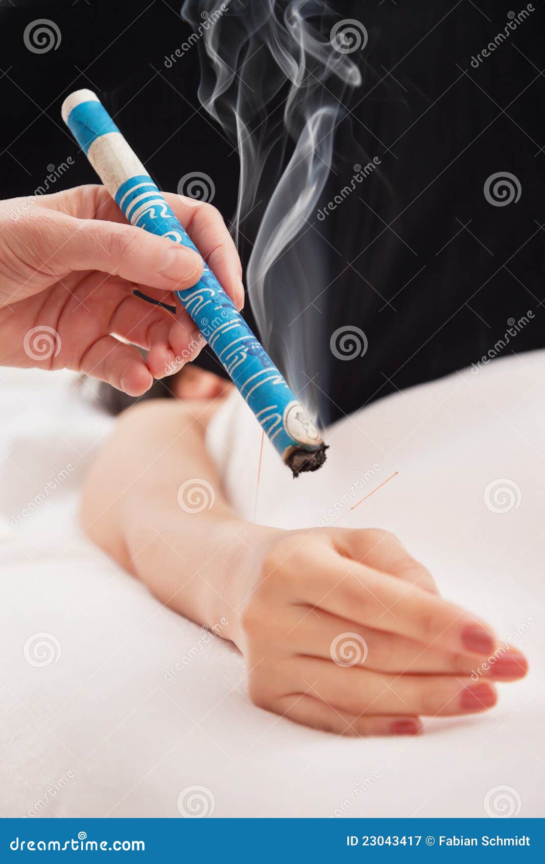 Hand applying moxa stick stock image. Image of oriental - 23043417