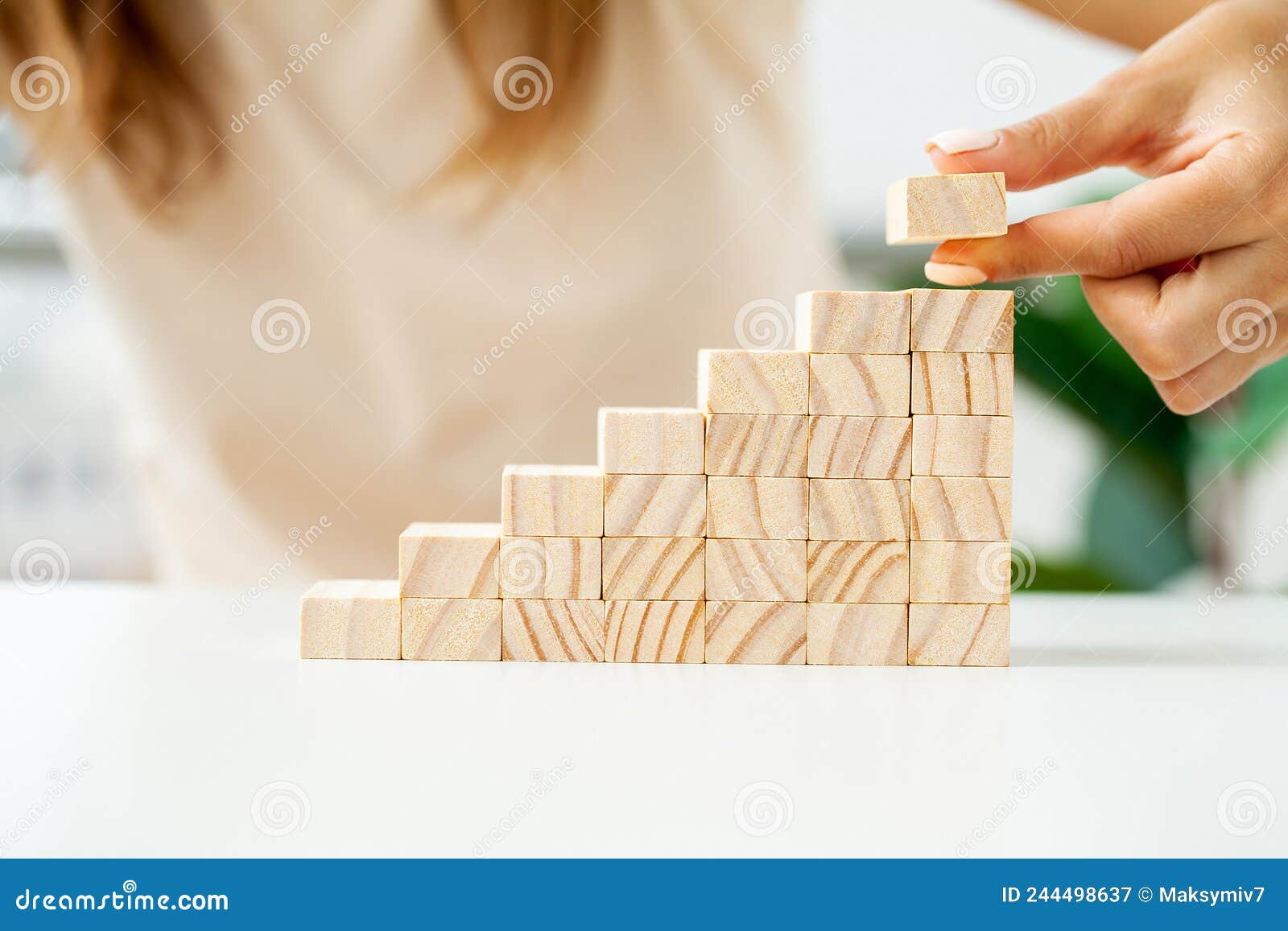 Hand Arranging Wood Cube Stacking As Stair Step Shape Stock Image ...