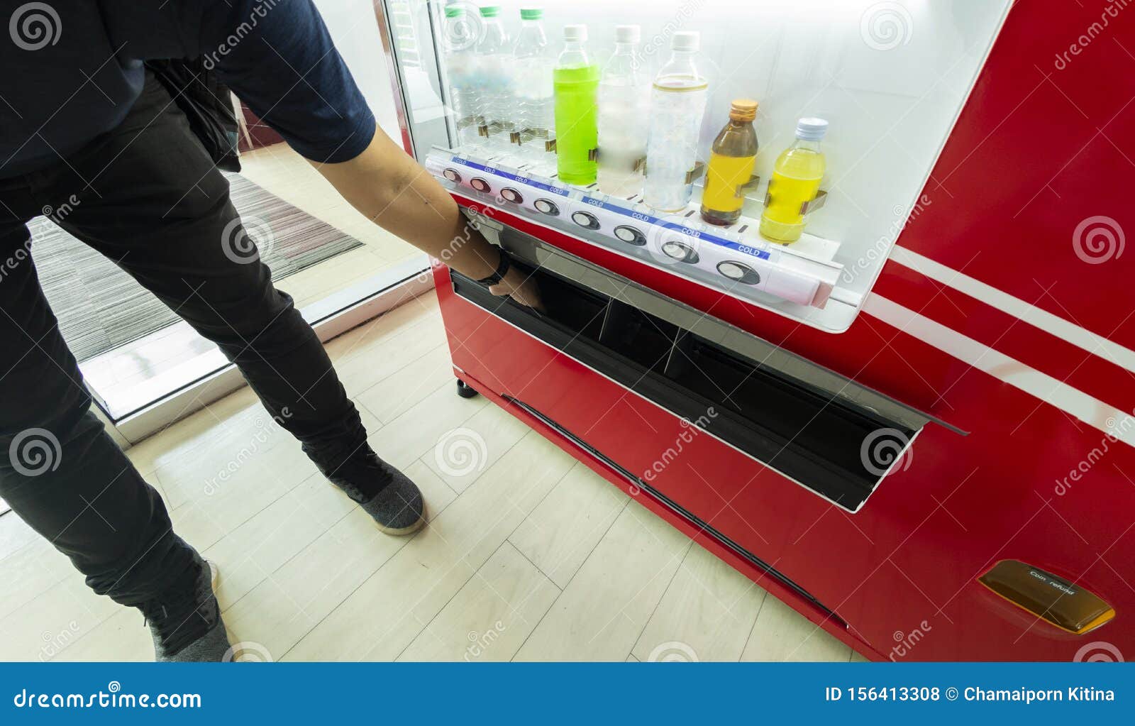 Hand of Asian Man Collecting Beverage from Automatic Dispenser Vending ...