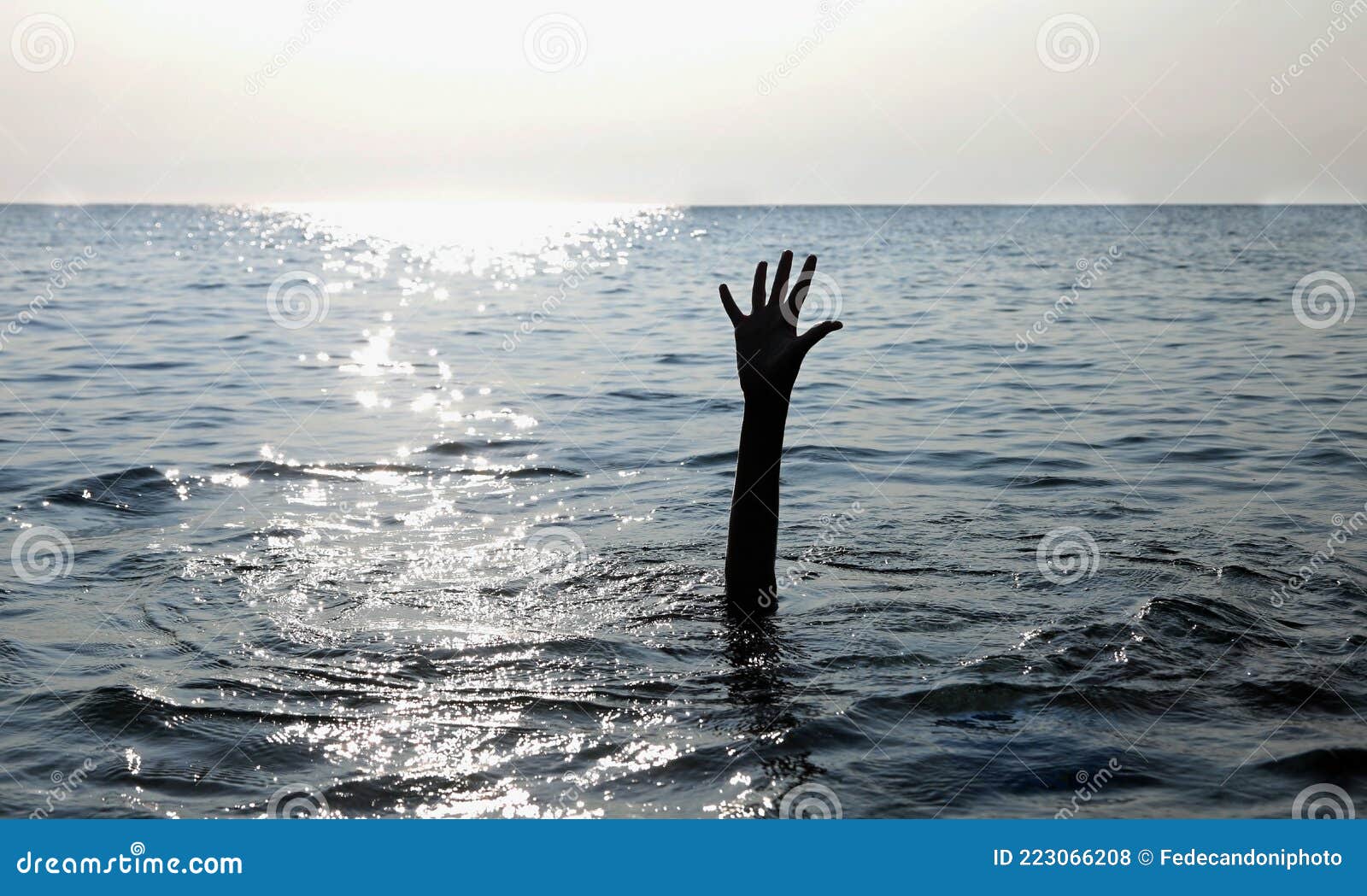 Hand ask help on the water stock photo. Image of disruption - 223066208