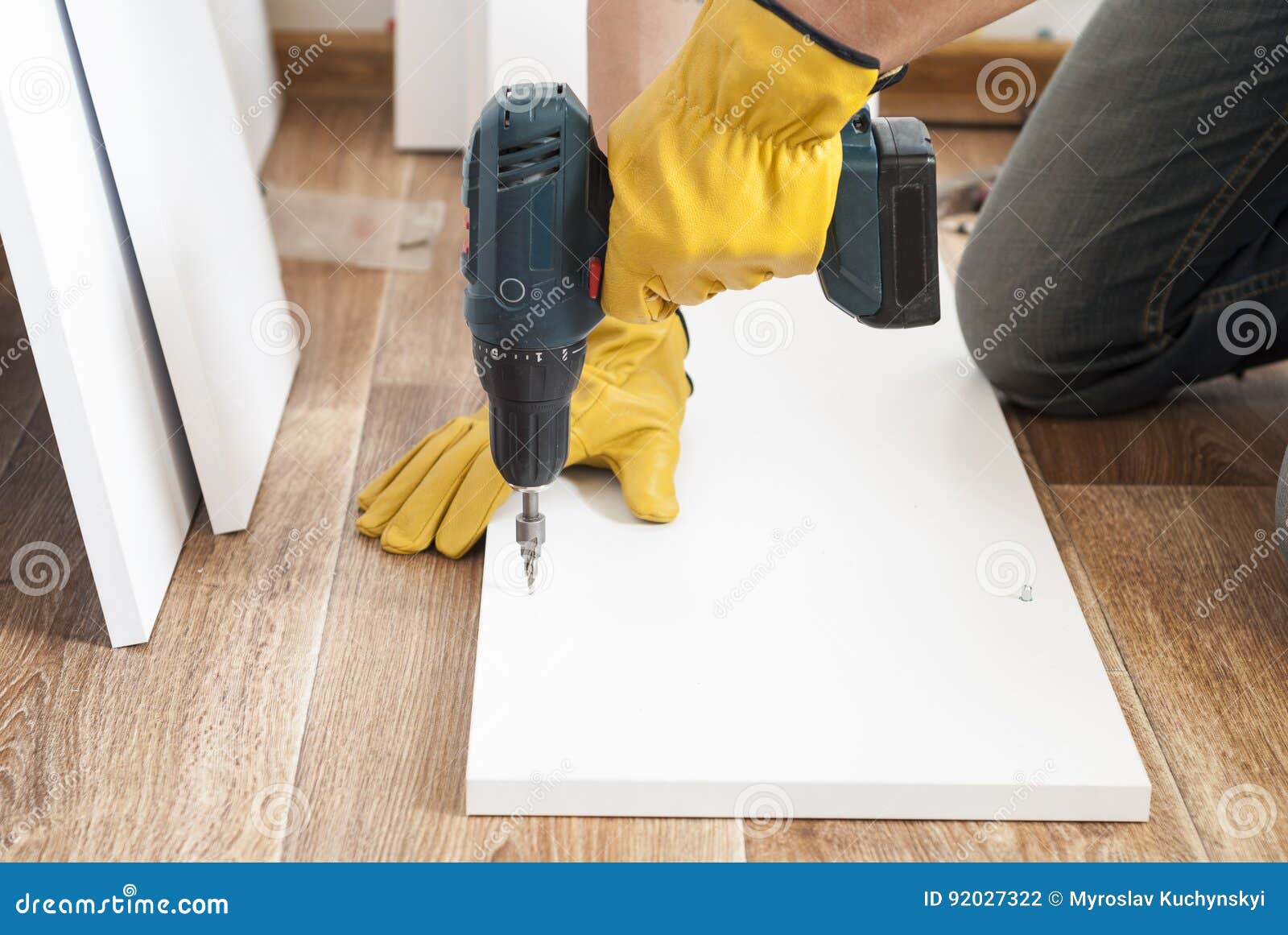 Hand assembly of furniture stock photo. Image of building - 92027322