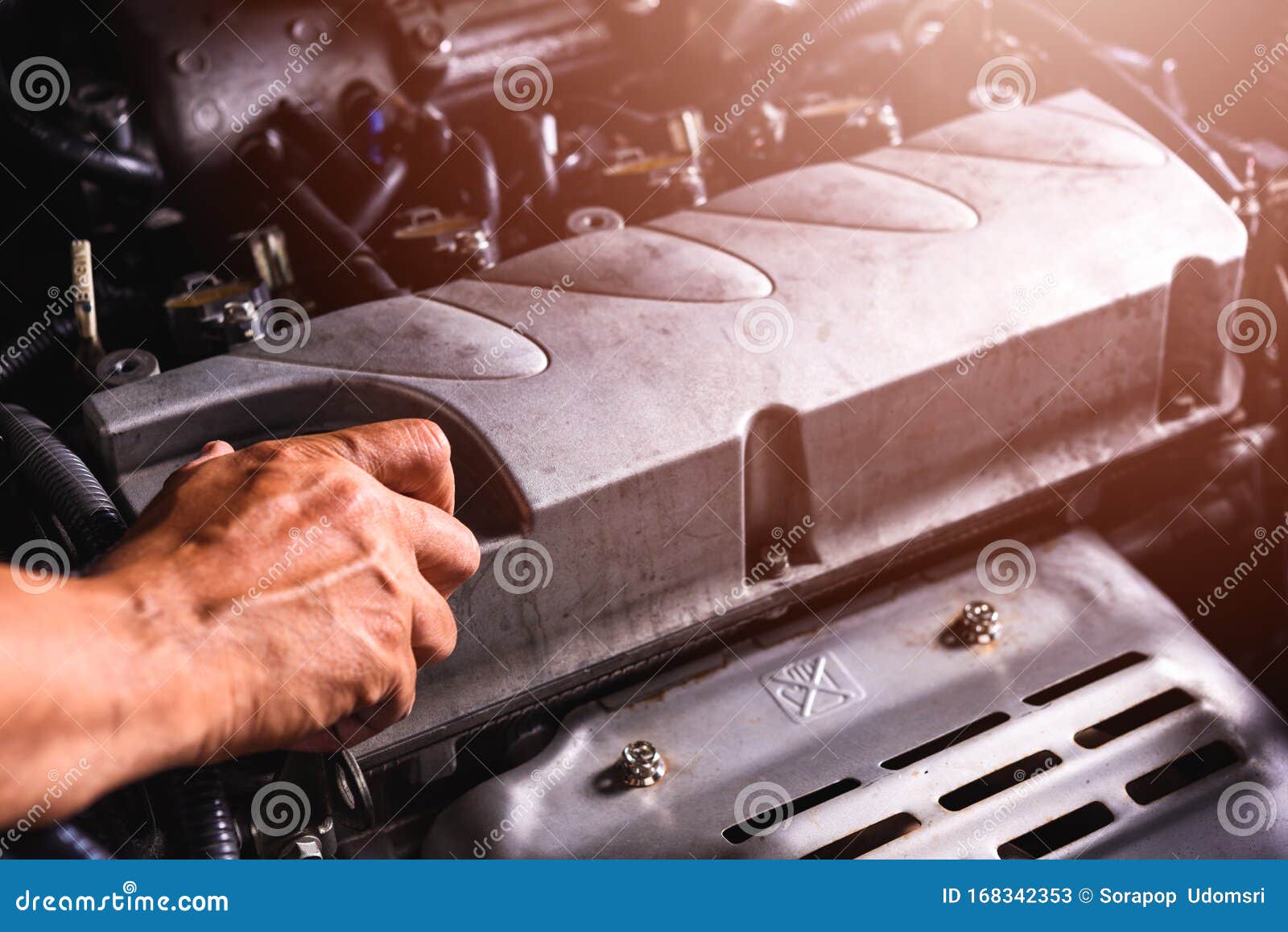 Hand of Auto Mechanic Technician Service Engine and Open the Engine Oil ...