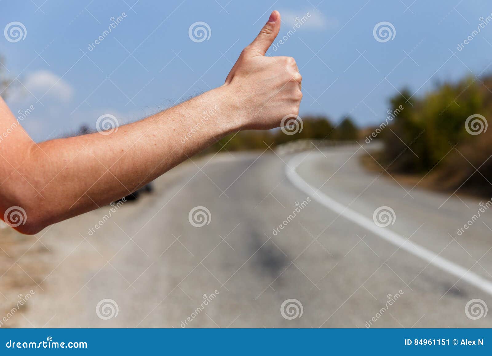 Hand on background of road stock image. Image of background - 84961151