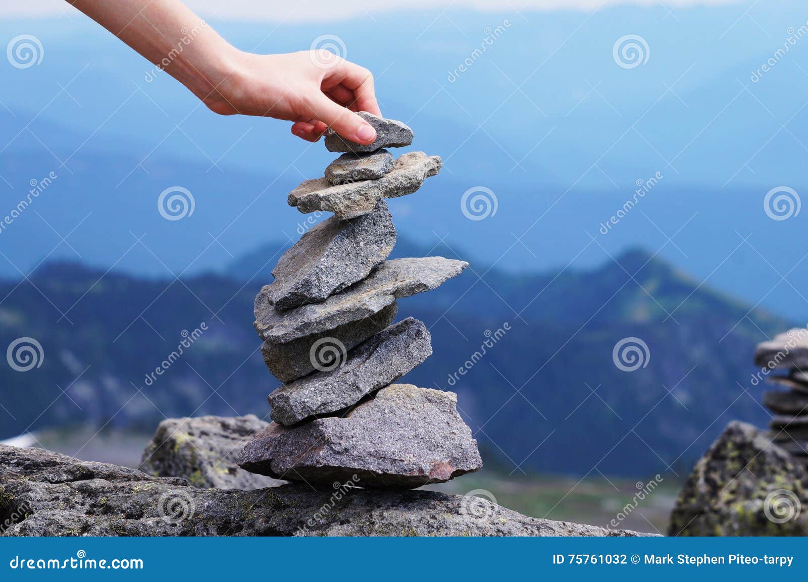 Hand Balanced Rock Tower, Mountain Background Royalty-Free Stock Image ...