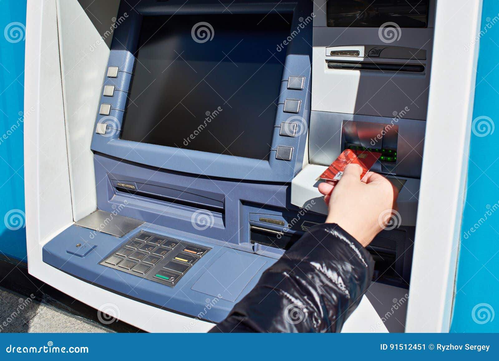 Hand with bank card at ATM stock image. Image of connection - 91512451