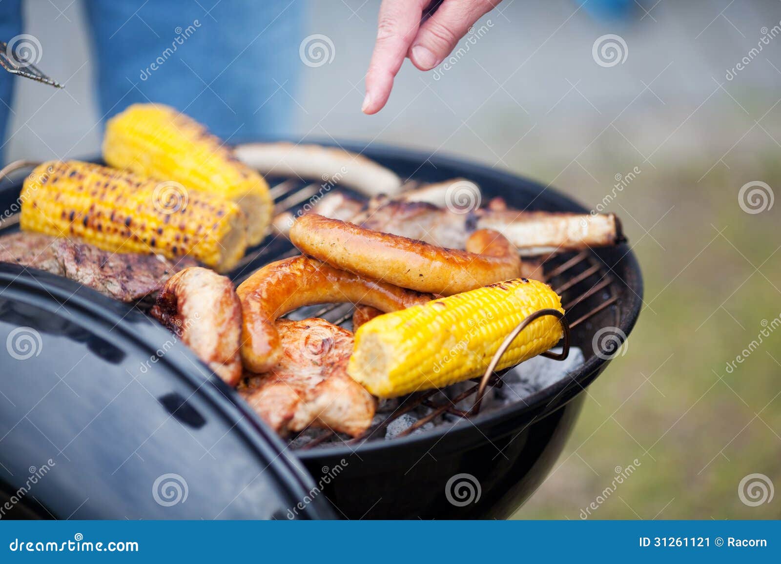 Hand Barbecuing Meat and Corn Stock Image - Image of barbecue ...