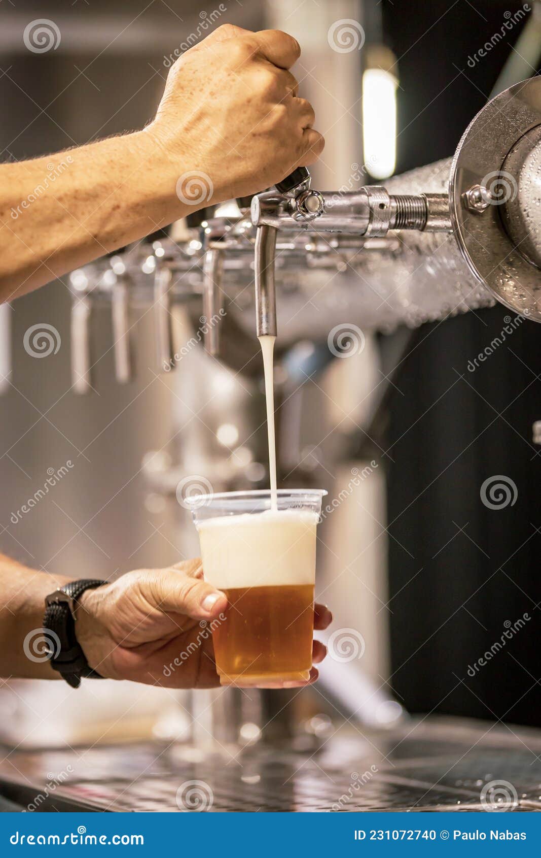 Hand of Bartender Pouring Beer Stock Photo - Image of draft, cold ...