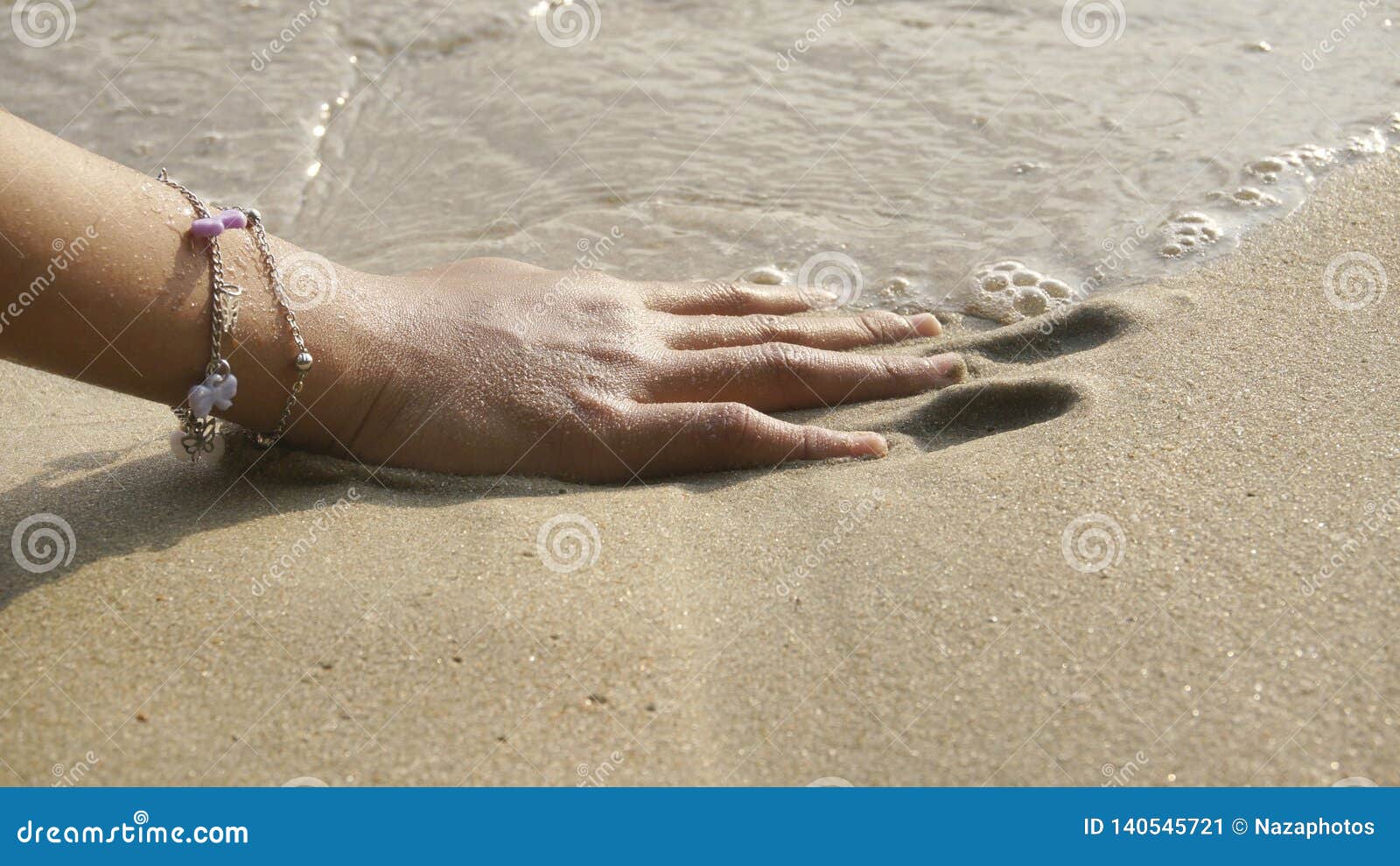 Hand and beach stock image. Image of romantic, people - 140545721