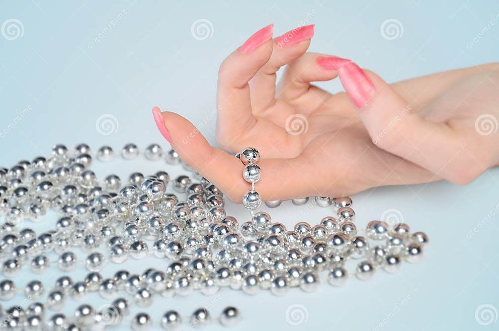 Hand with beads stock image. Image of hold, fashion, female - 41314947