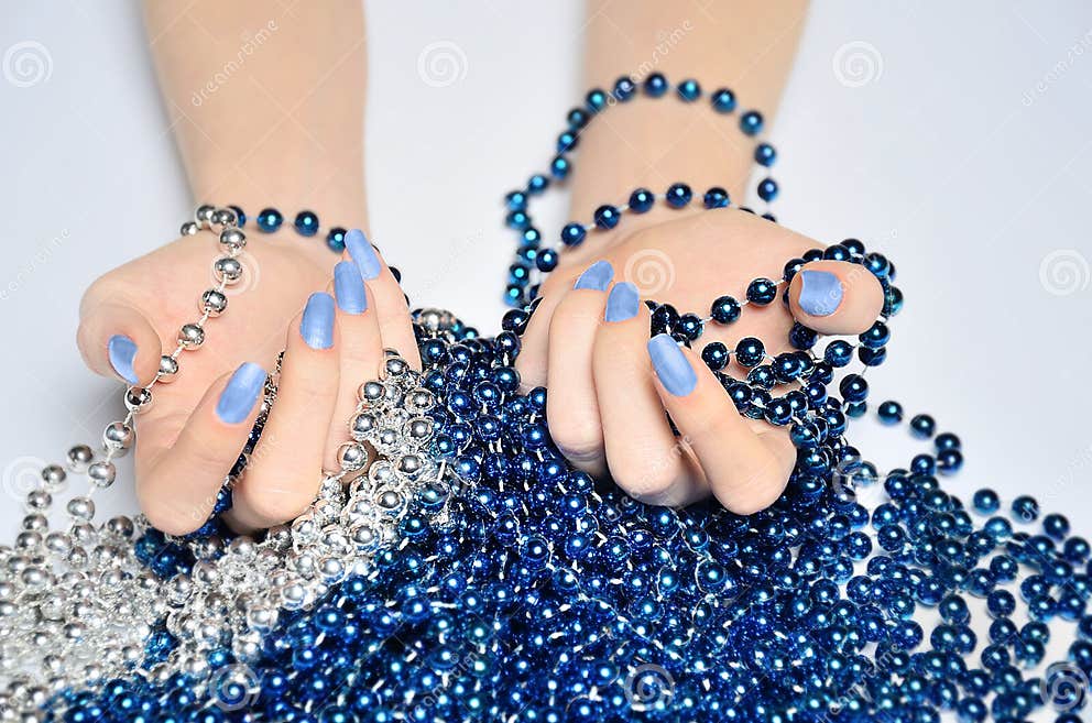 Hand with beads stock photo. Image of fingernail, hand - 41314982