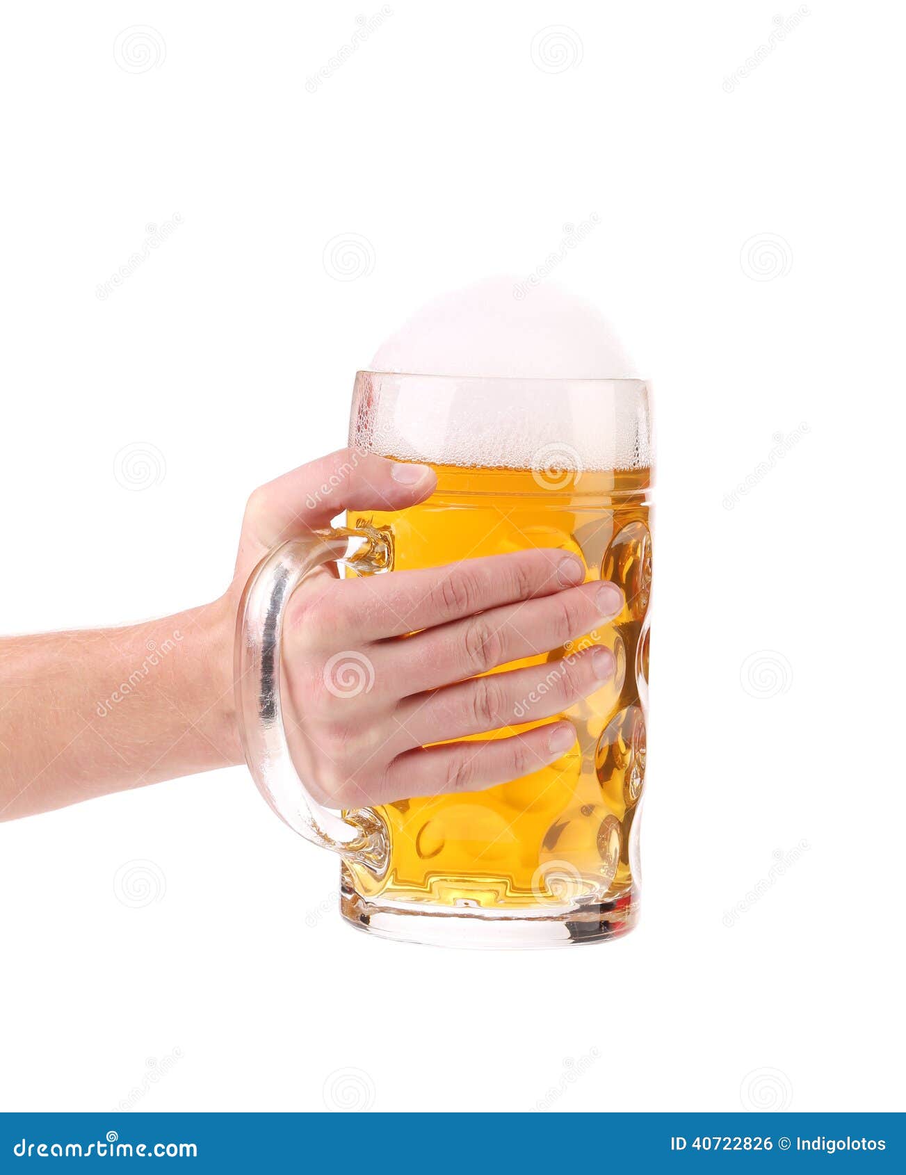 Hand with a beer glass. stock photo. Image of yellow - 40722826