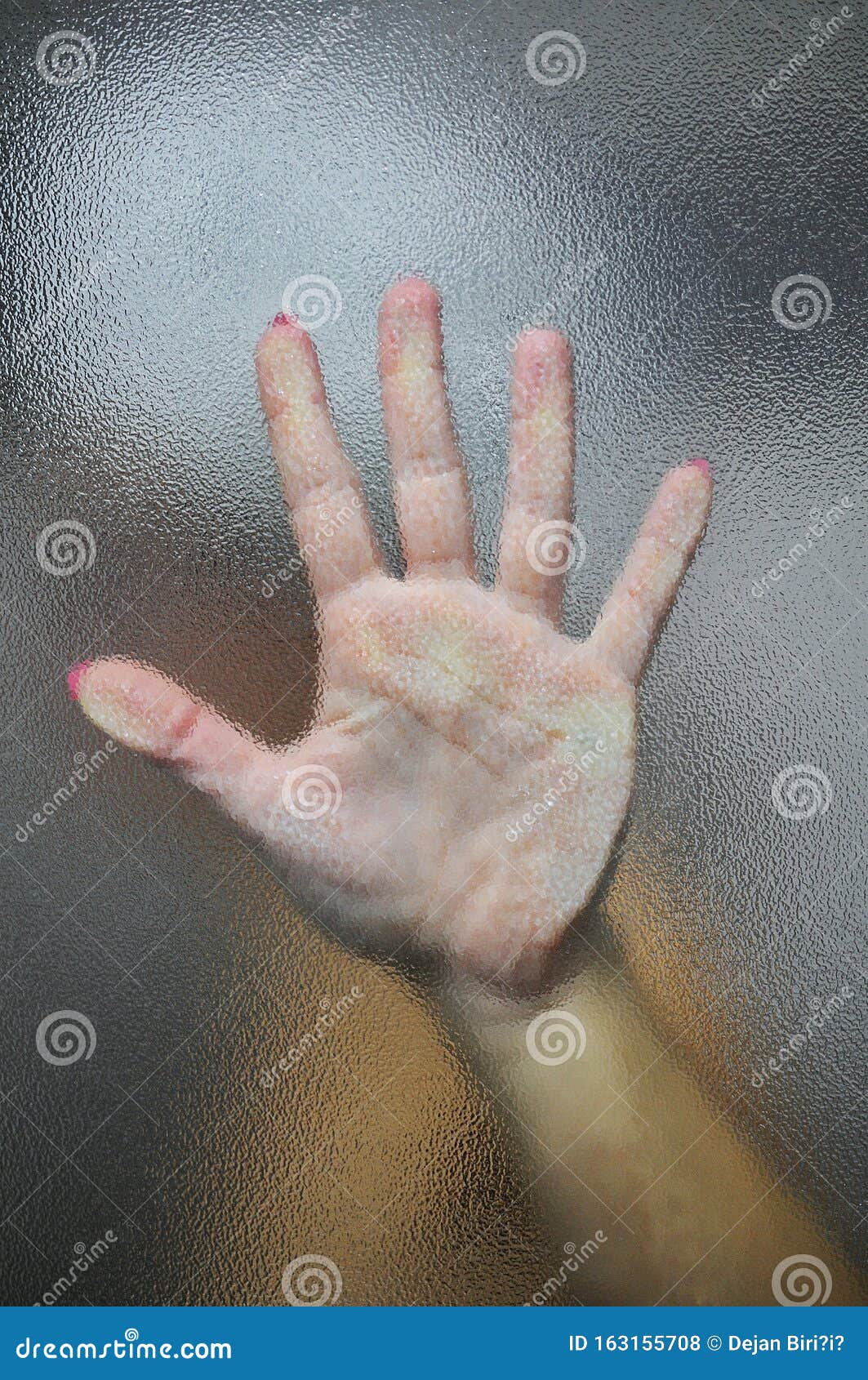 Hand behind the glass stock photo. Image of hand, glass - 163155708