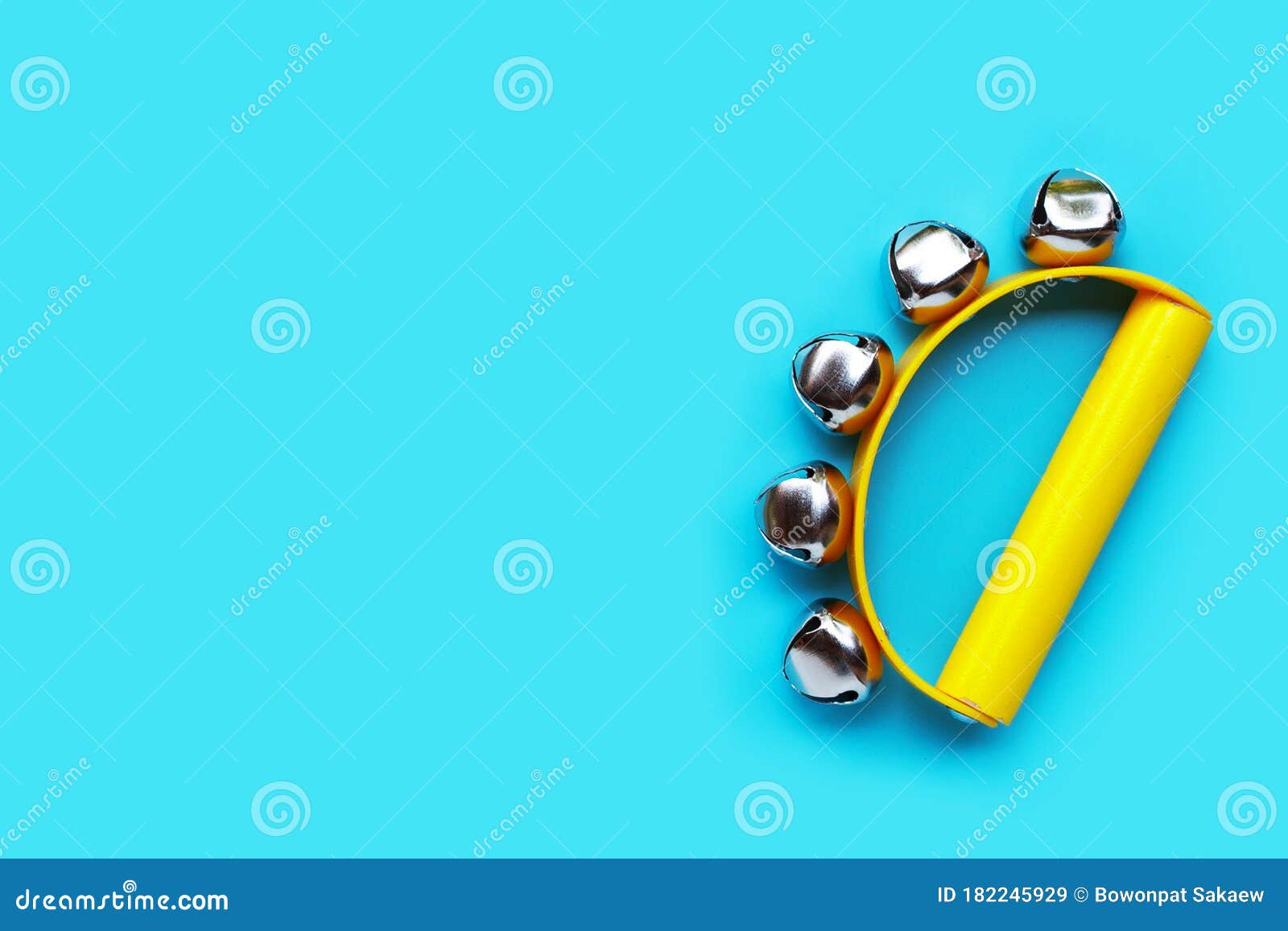 Hand Bells Musical Instrument for Ringing on Blue Background Stock ...