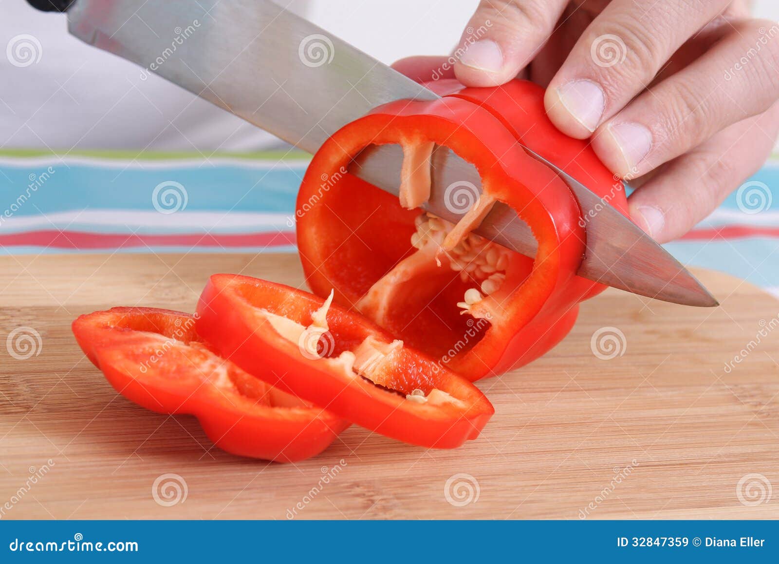 Hand with Big Knife Cutting Red Pepper Stock Image - Image of cooking ...